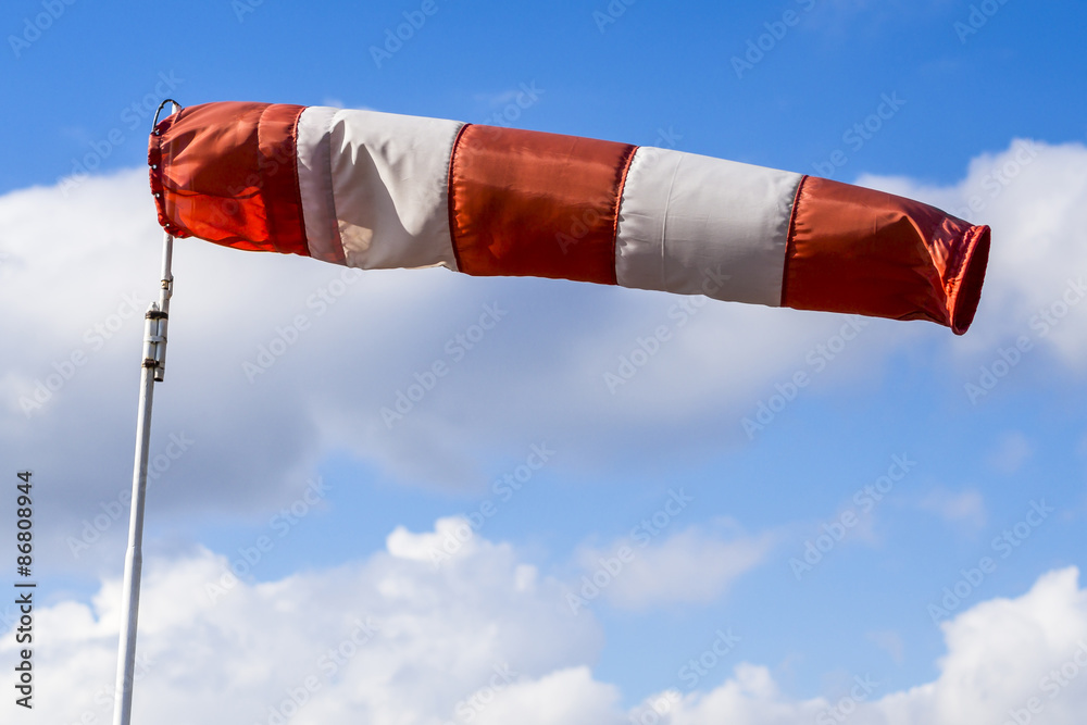 Windsack vor blauem Himmel Stock-Foto | Adobe Stock