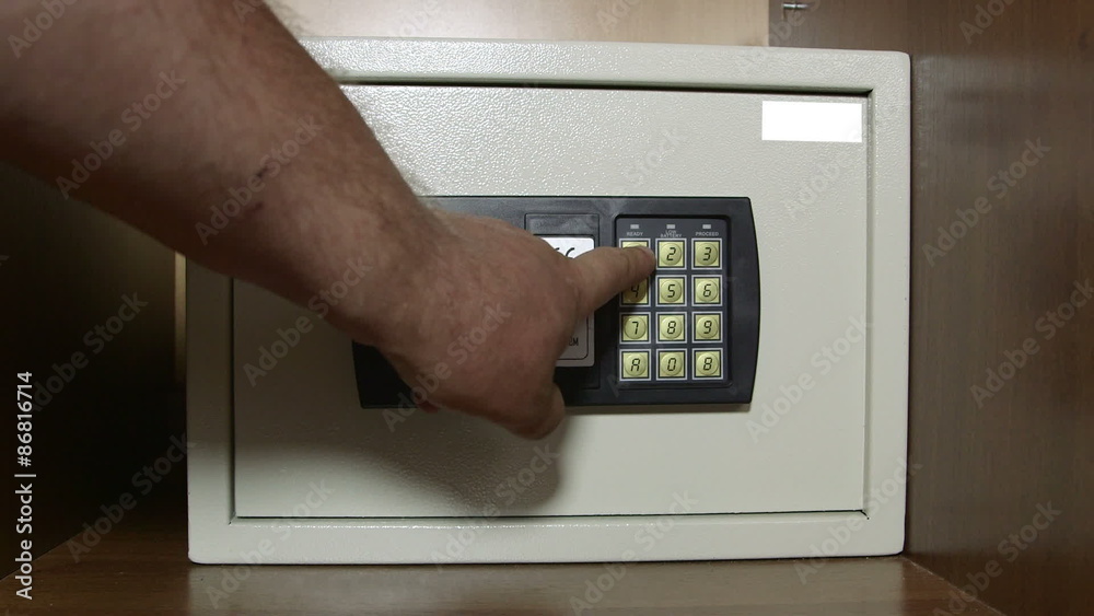Safe box with digital lock hidden in wardrobe at home or hotel room ...