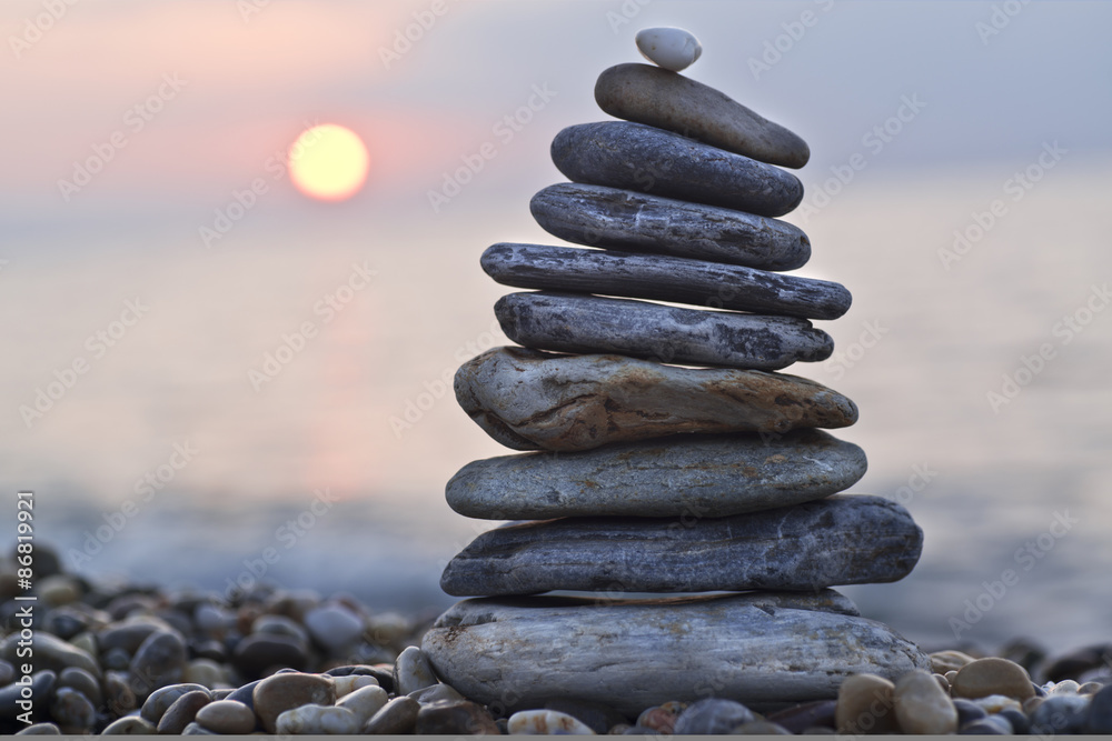 Stack of pebbles on beach. Natural background Stock Photo | Adobe Stock