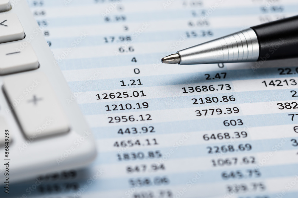 Financial Statement With Calculator And Pen Stock Photo | Adobe Stock