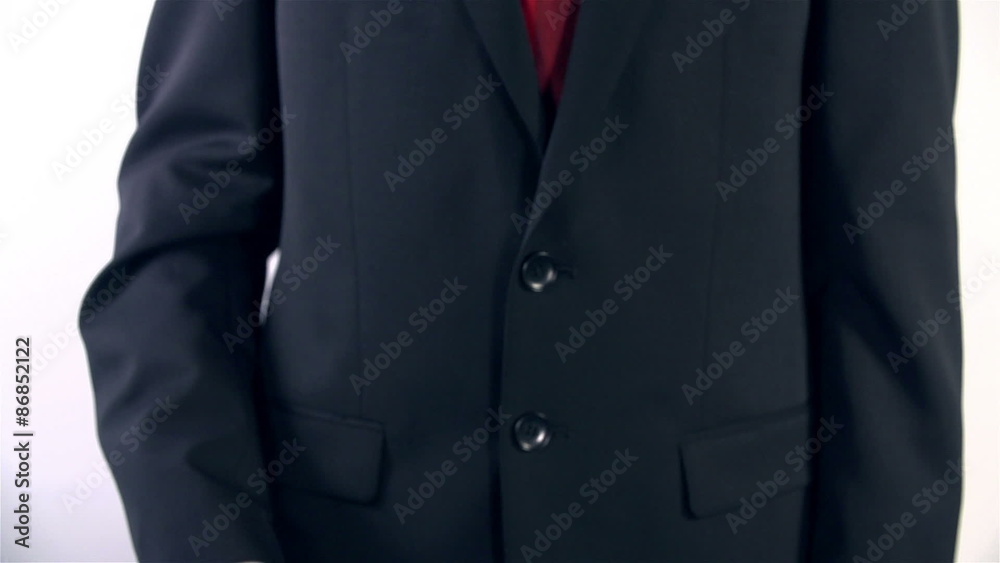 Close up of Man in Suit putting Mobile Phone in jacket Stock Video ...