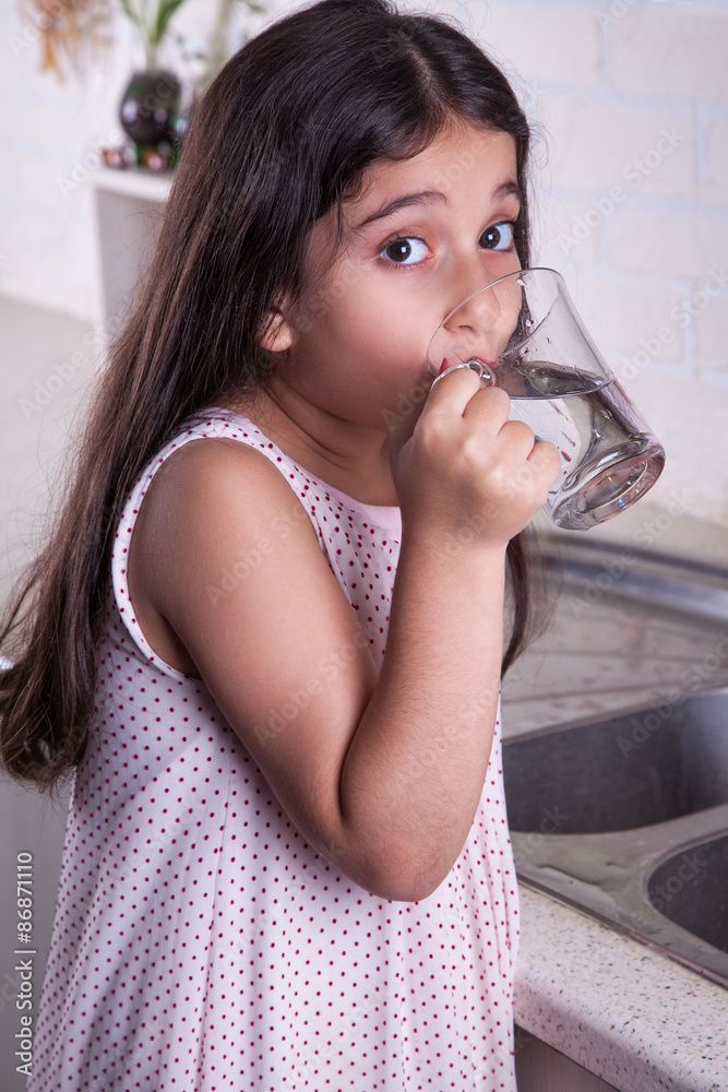 Little Girl With Black Hair And Brown Eyes