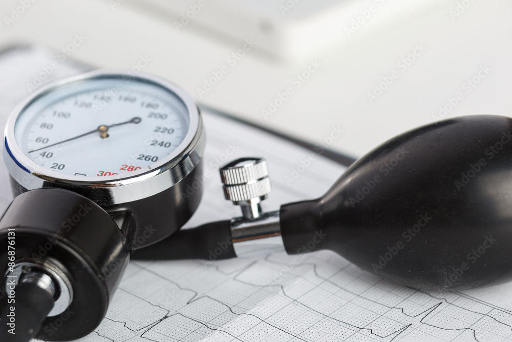 Medical manometer lying on cardiogram chart closeup Stock Photo | Adobe ...