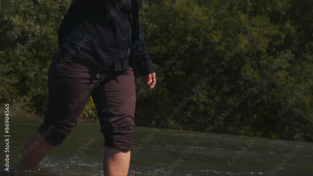 Girl Slowly Goes Through River Stock Video | Adobe Stock