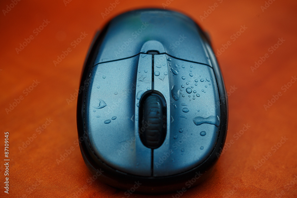 computer mouse and water drop. Stock Photo | Adobe Stock