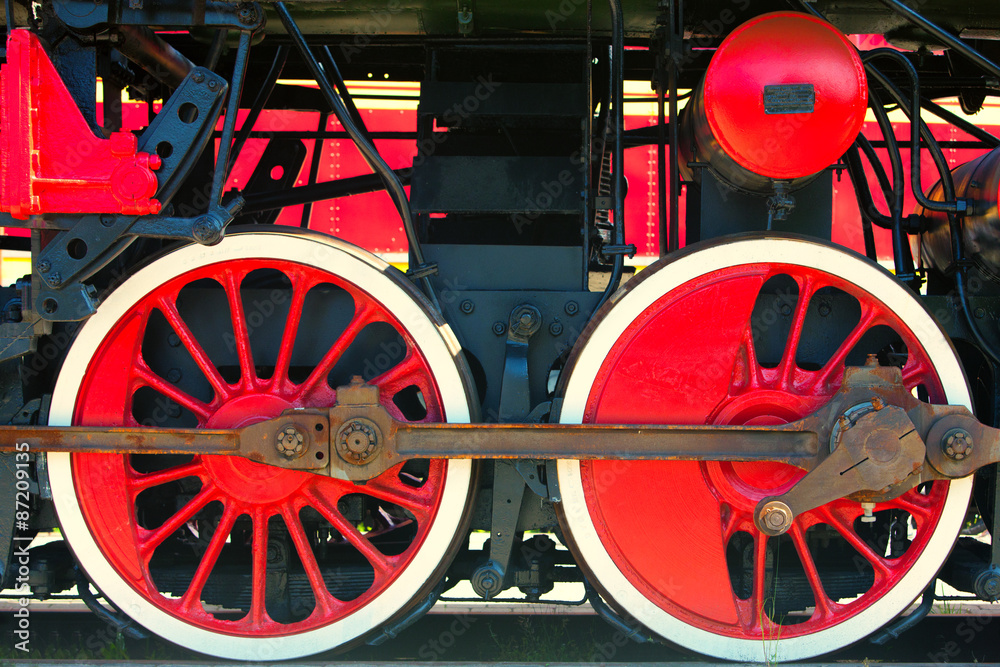 Red locomotive wheel with black mechanisms Stock Photo | Adobe Stock