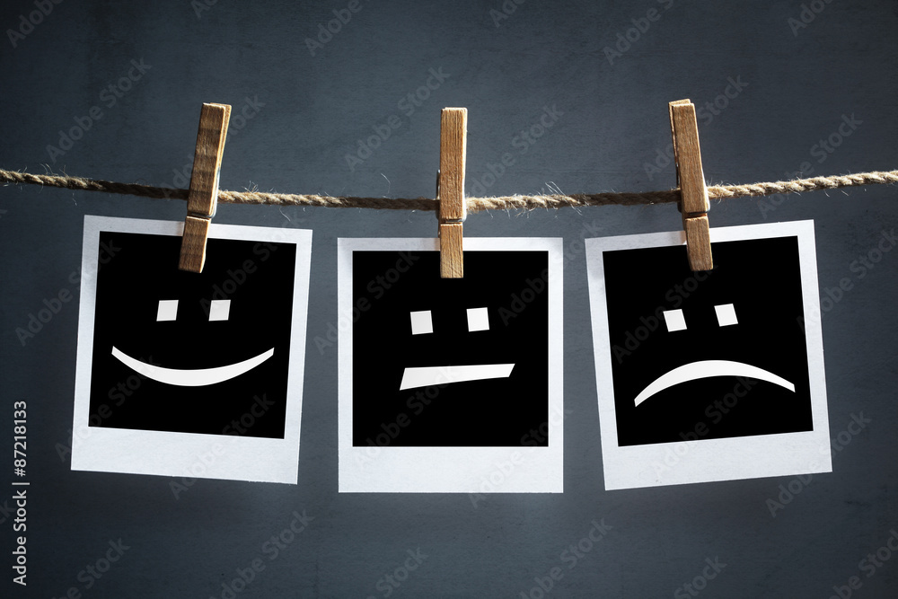 Happy, sad and neutral emoticons on instant print photographs Stock ...