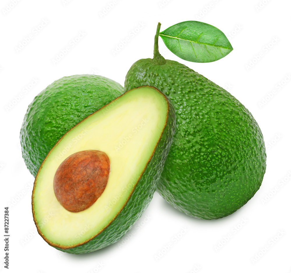 Two fresh green ripe avocado whith leaf and slice of avocado with core ...