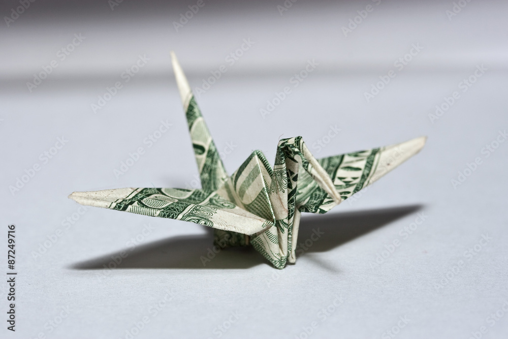 origami crane from a money note Stock Photo | Adobe Stock