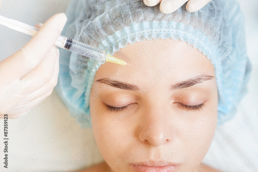 Cosmetologist at spa beauty salon doing acne treatment using mechanical ...