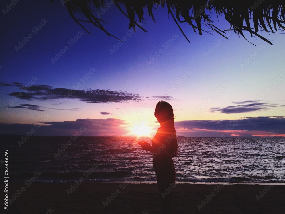 girl chilling on beach Stock Photo | Adobe Stock