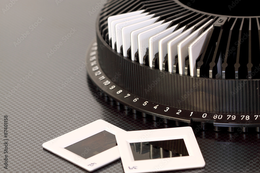 Slides carousel. Slides in a carousel on carbon background. Stock Photo ...