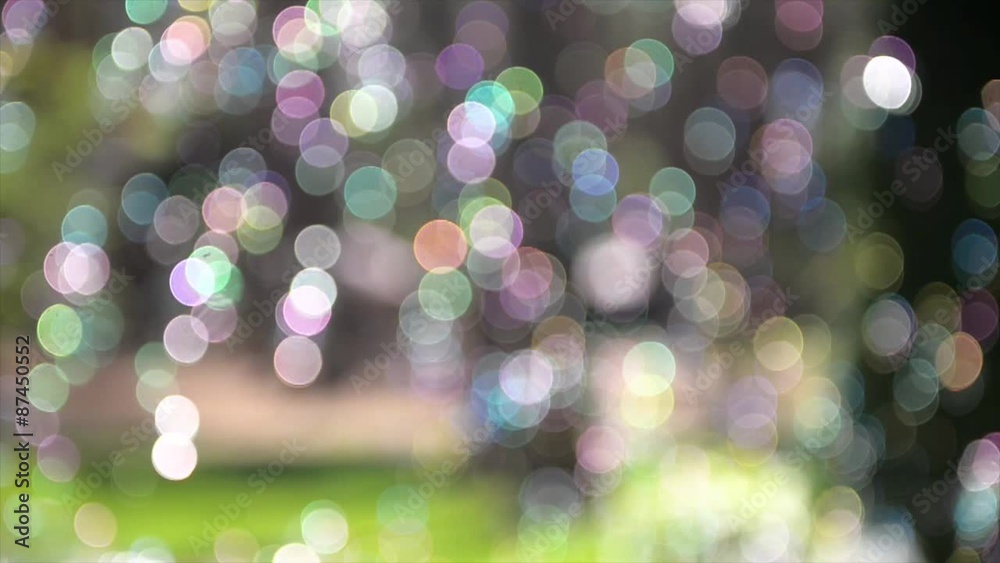 Blurry soap bubbles of the automatic machines on nature background/Many ...