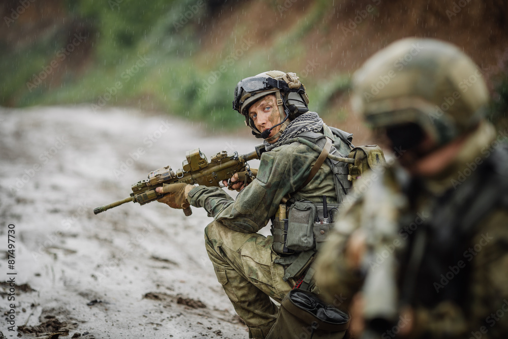 Portrait of a ranger in the battlefield with a gun Stock-Foto | Adobe Stock