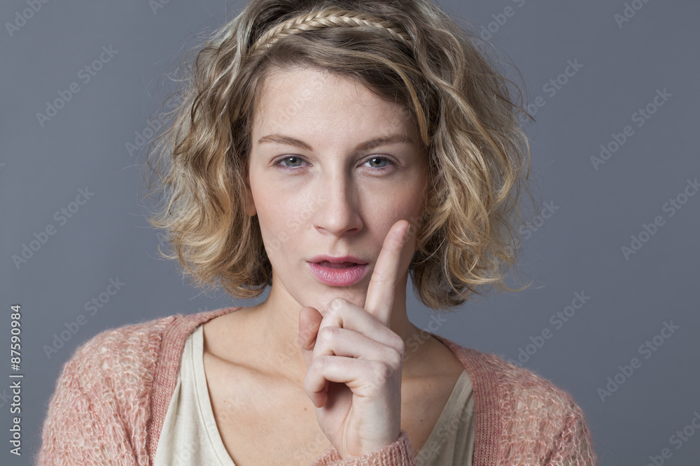 threatening 20s blonde girl showing her index finger for signal of ...