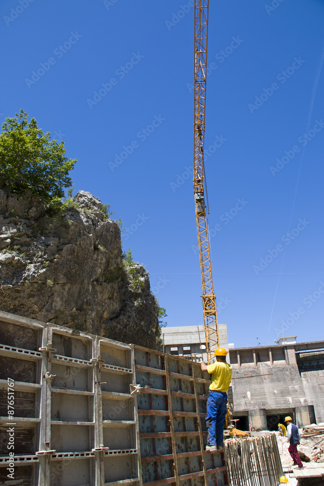 Working with prefabricated formwork on construction site Stock Photo ...