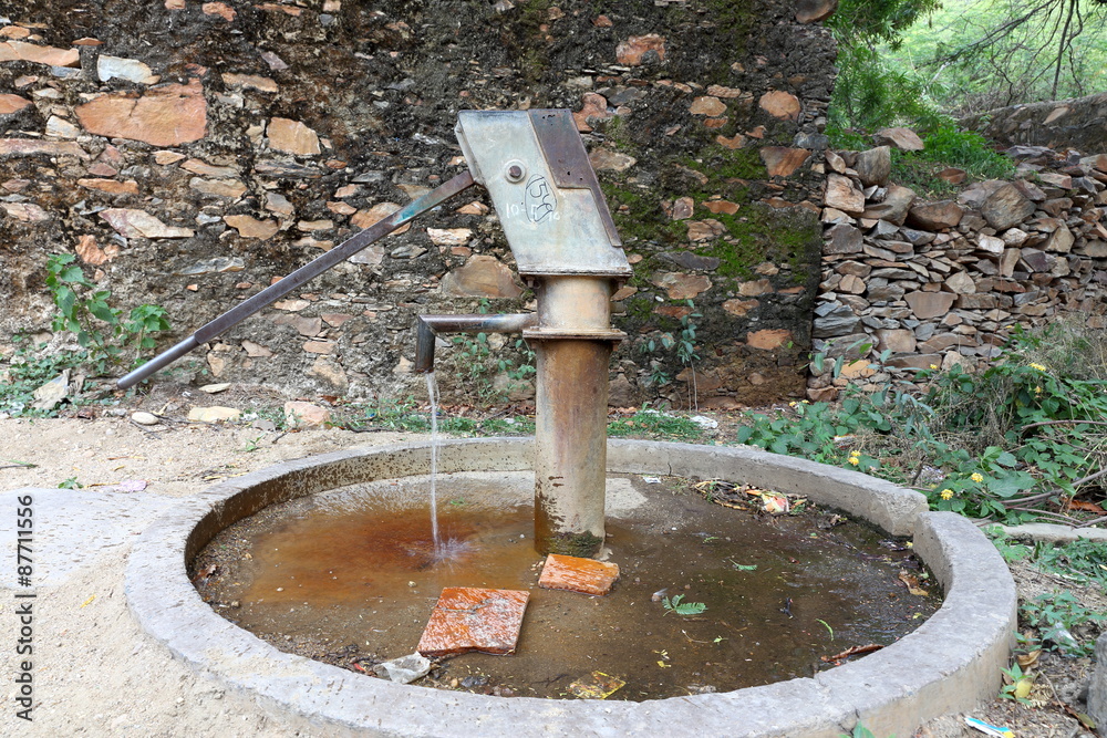 hand pump to pull under ground water in india Stock Photo | Adobe Stock