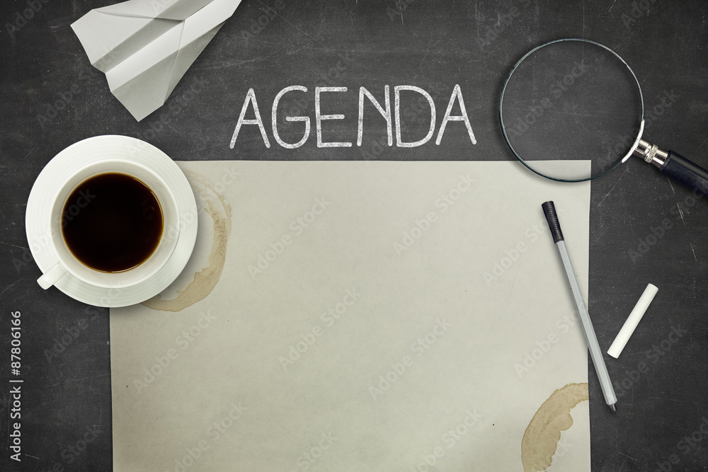 Agenda concept on black blackboard with empty paper sheet Stock Photo ...