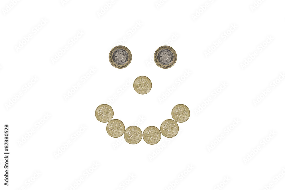 smiley face made out of one pound coins Stock Photo | Adobe Stock