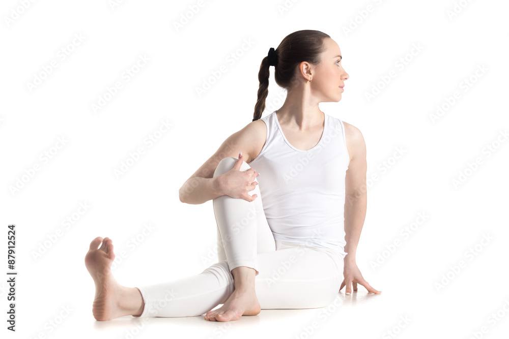 Ardha Matsyendrasana yoga pose Stock Photo | Adobe Stock
