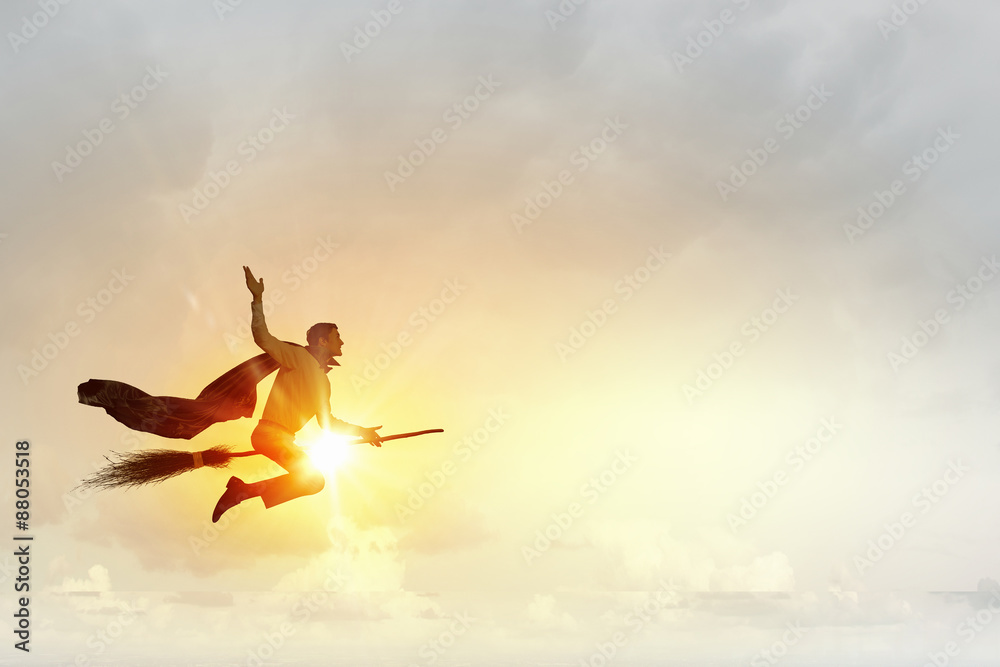 Man ride broom Stock Photo | Adobe Stock