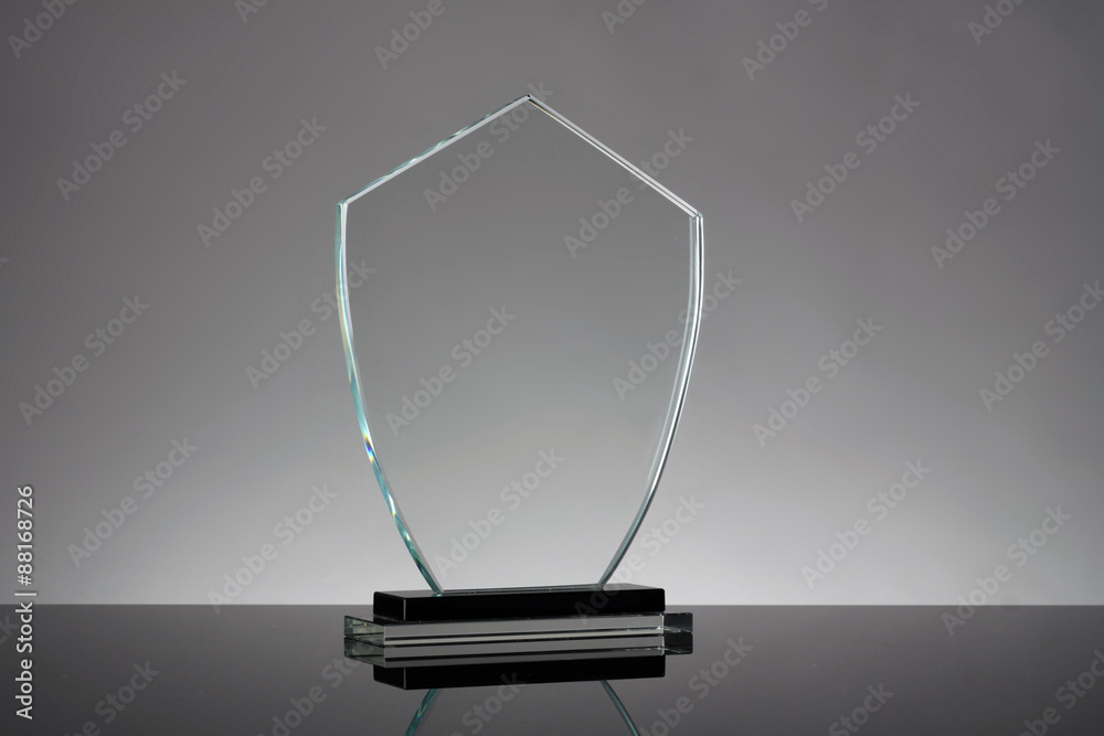 glass trophy in gray background Stock Photo | Adobe Stock