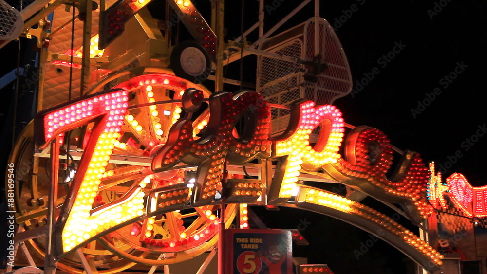 Midway Carnival Lights 13. The Zipper carnival ride at the CNE midway ...