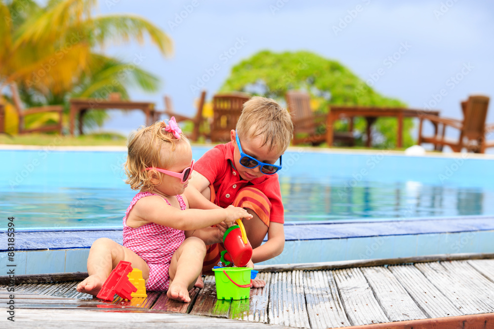 kids playing in swimming pool at the beach Stock Photo | Adobe Stock