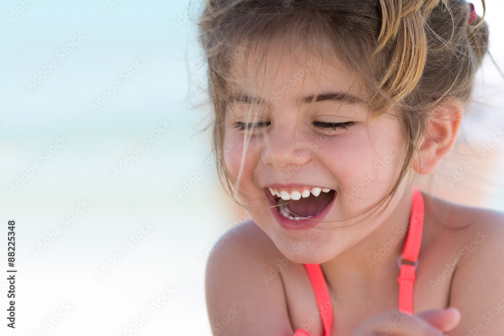 Happy smiling little girl on beach vacation, blu sea background Stock ...