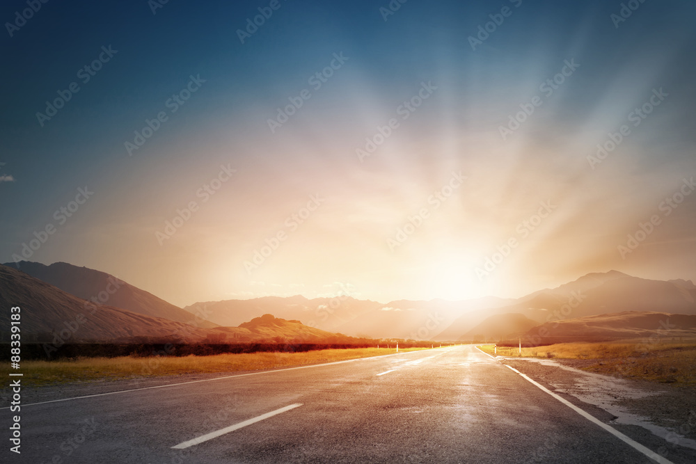 Sunrise above road Stock Photo | Adobe Stock