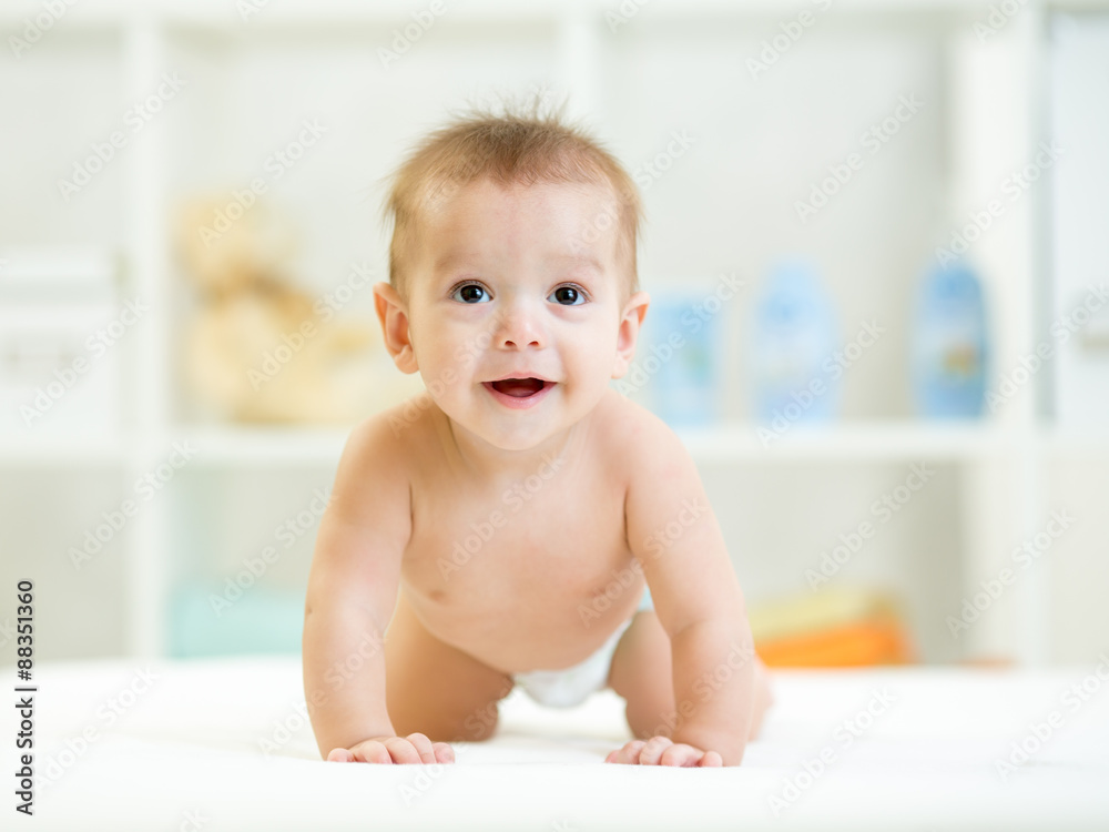 baby laughing, creeping and playing in nursery Stock Photo | Adobe Stock
