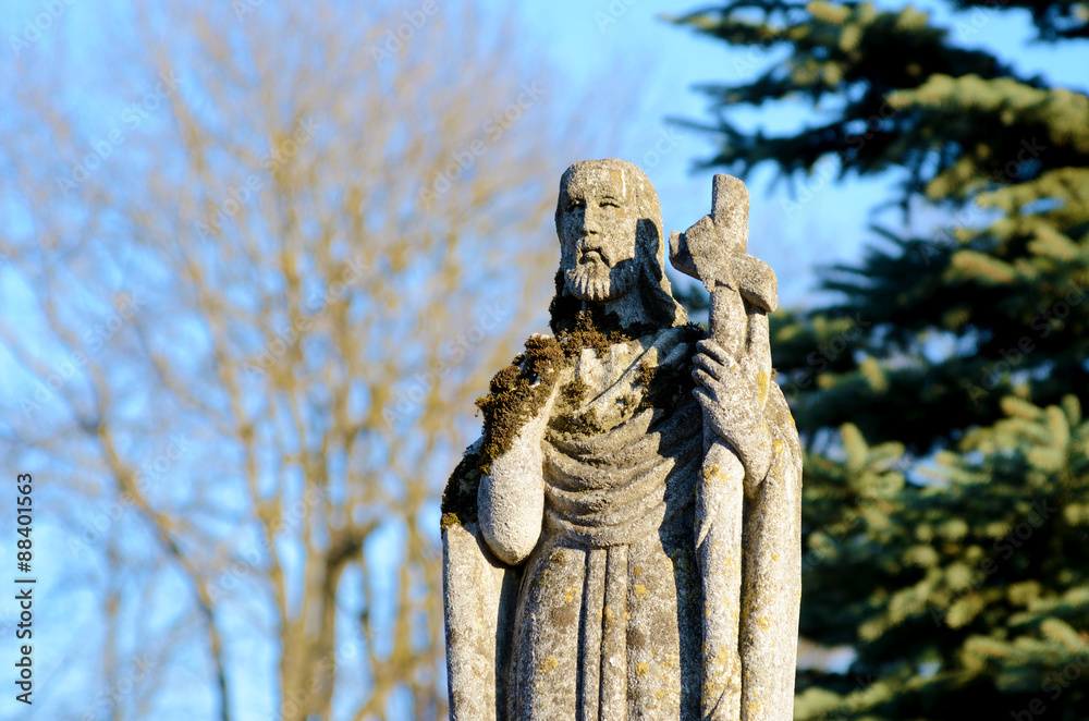 Old stone statue at the tomb of St. Peter in the old cemetery on Stock ...