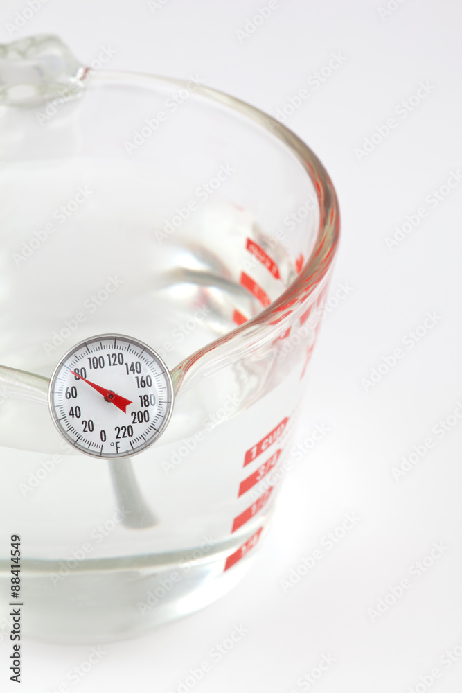 Beaker With Water And Thermometer