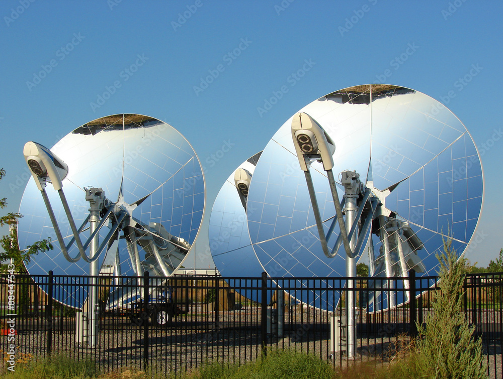 parabolic dish solar collectors facing sun Stock Photo | Adobe Stock