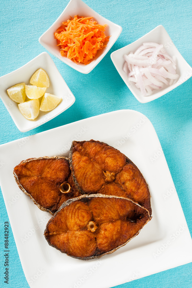 Indian seer fish fillets fry - Overhead view of seer (mackerel) fish ...