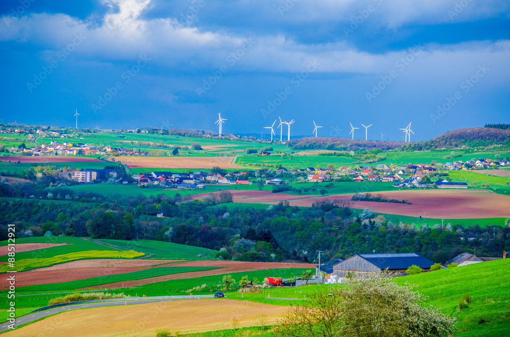 Typical countryside in luxembourg with small villages, forests, meadows ...