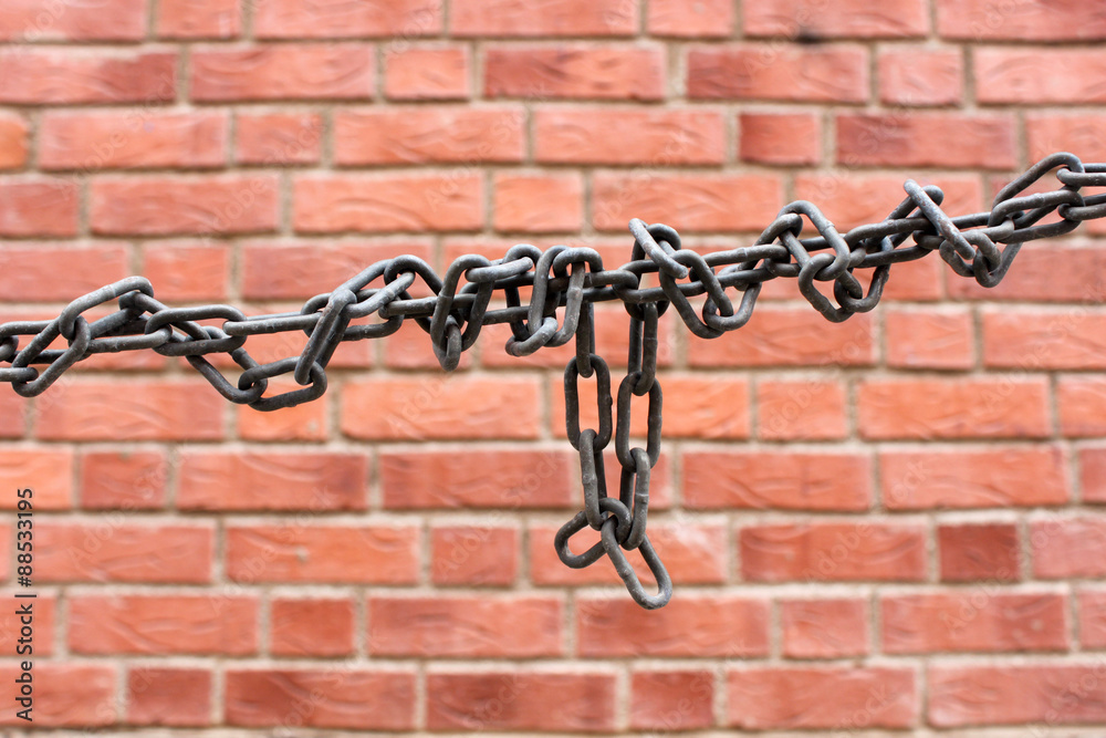 Chains and brick wall Stock Photo | Adobe Stock
