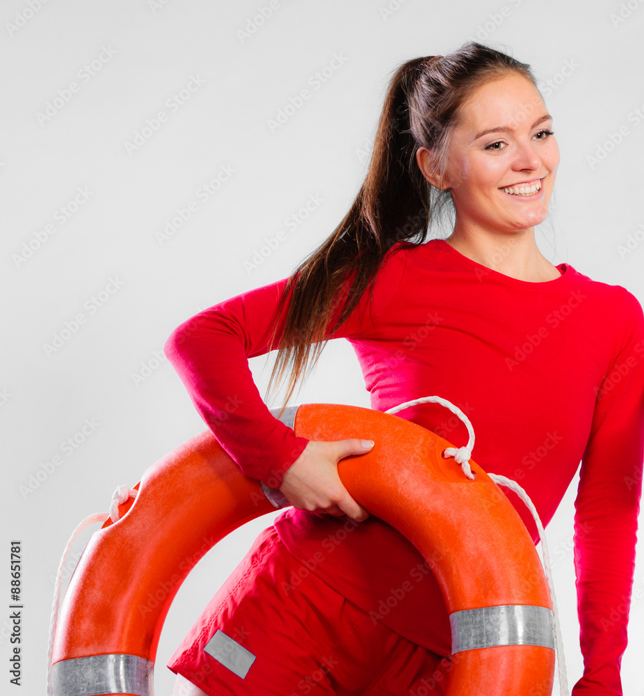 Girl lifeguard with rescue equipment Stock Photo | Adobe Stock