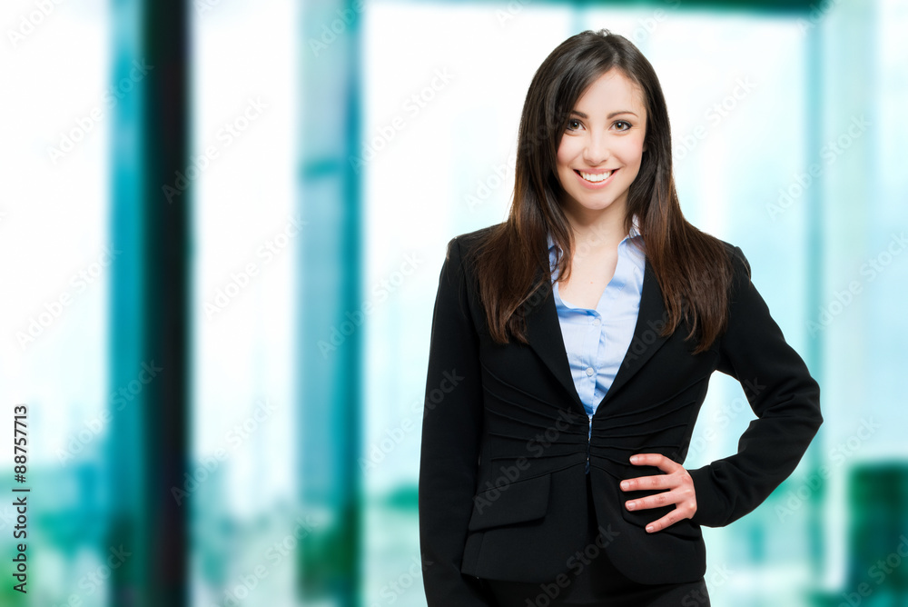 Smiling young female manager portrait Stock Photo | Adobe Stock