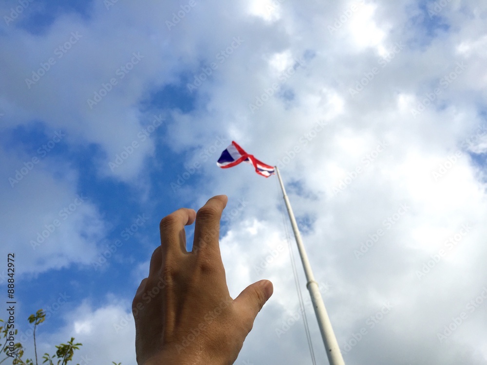 hand and flag pole Stock Photo | Adobe Stock