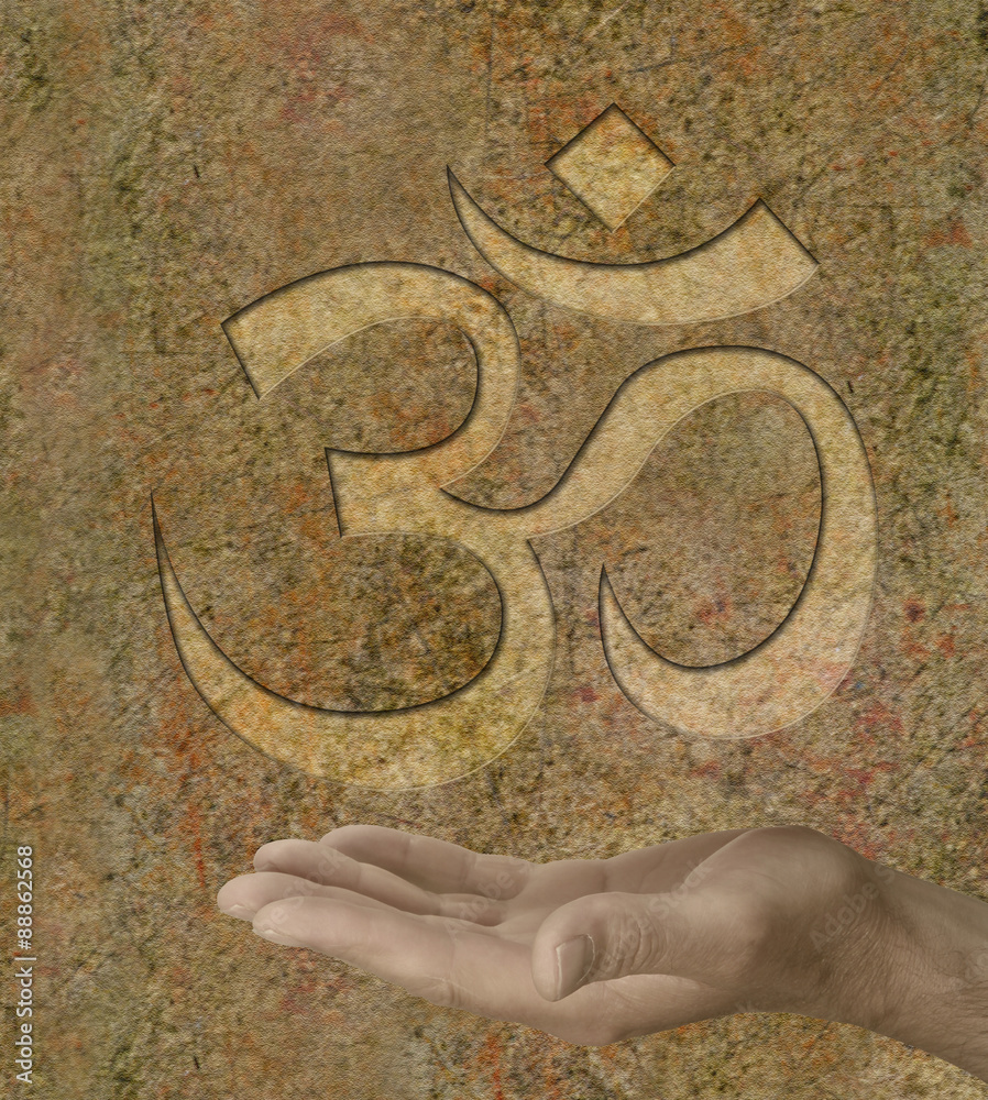 The Sound of the Universe - Om symbol engraved on stone effect ...