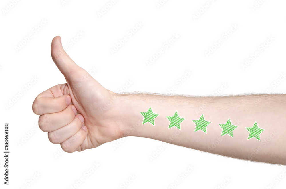 Man hand showing thumbs up and five star rating on the arm skin ...