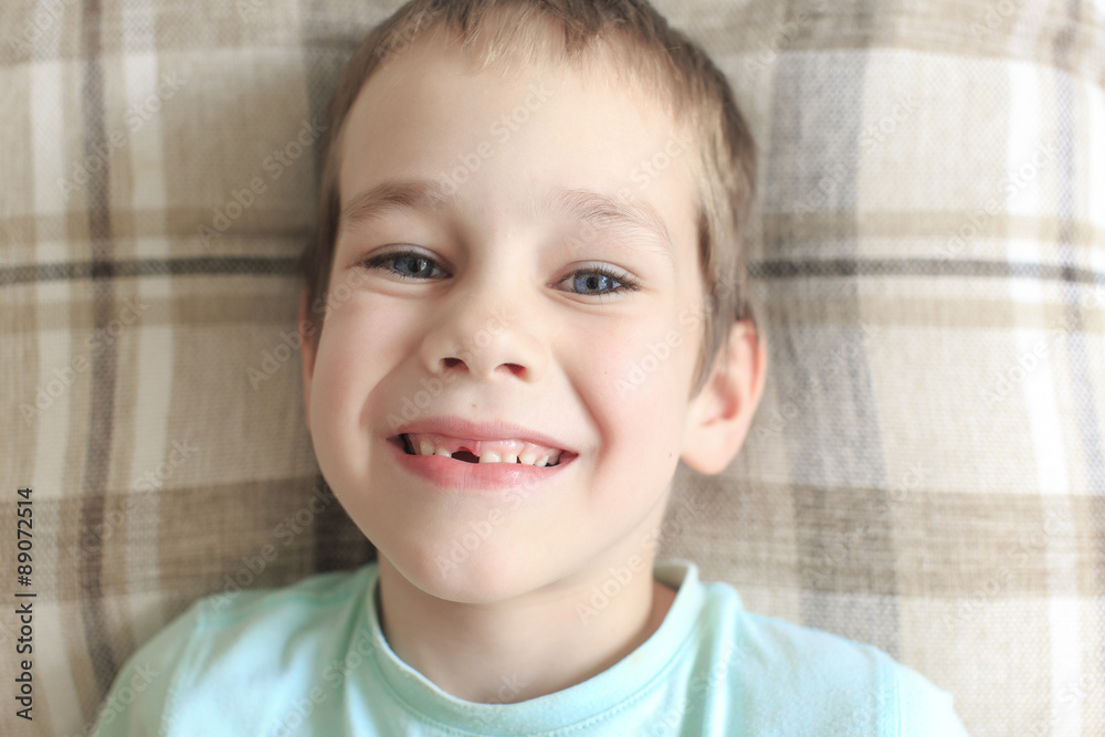 toothless smile. happy boy with a toothless smile Stock Photo | Adobe Stock