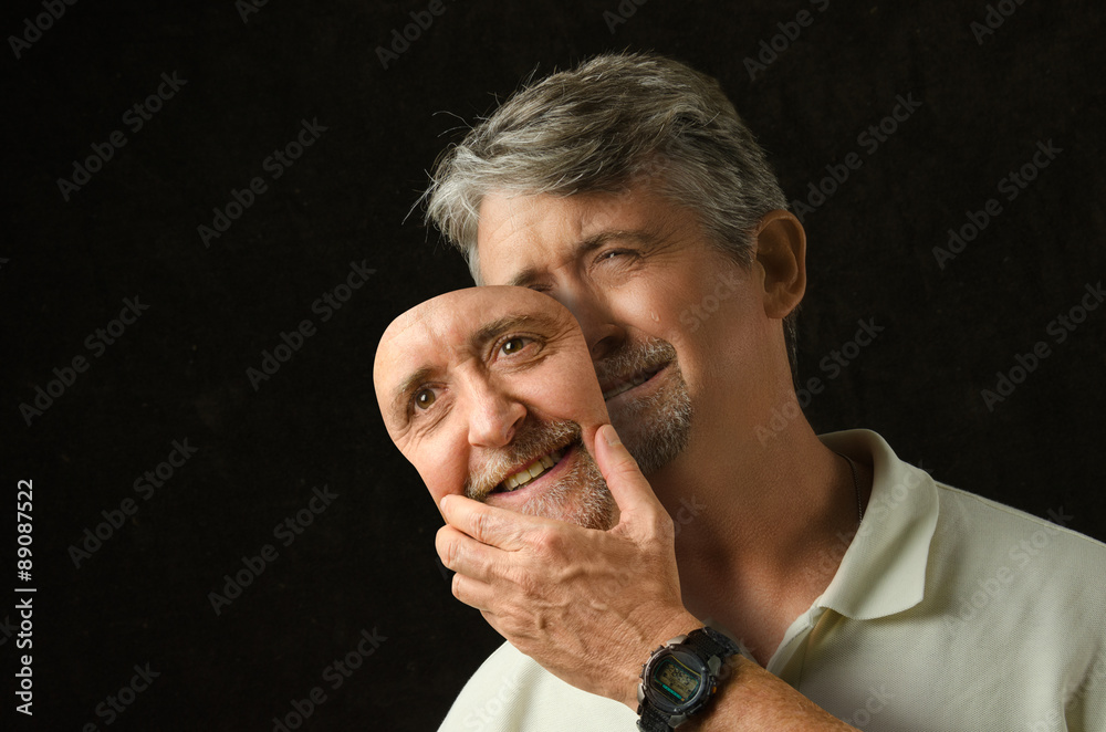 Bipolar disorder depressed crying man removing mask hiding his emotions ...