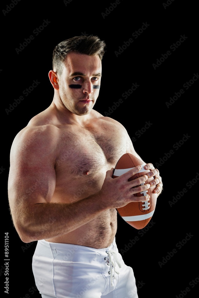 Shirtless American football player with ball Stock Photo | Adobe Stock