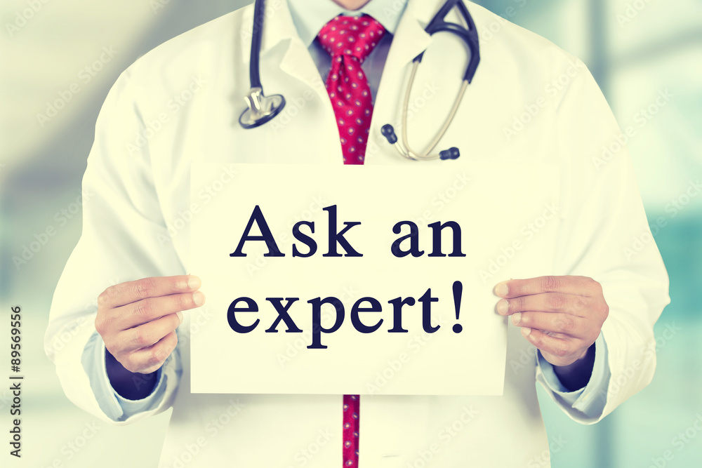 doctor hands holding white card sign with ask an expert text message ...