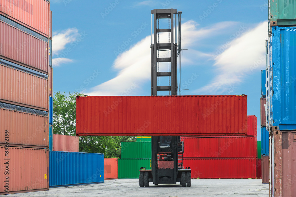 Forklift handling container box loading to depot Stock Photo | Adobe Stock
