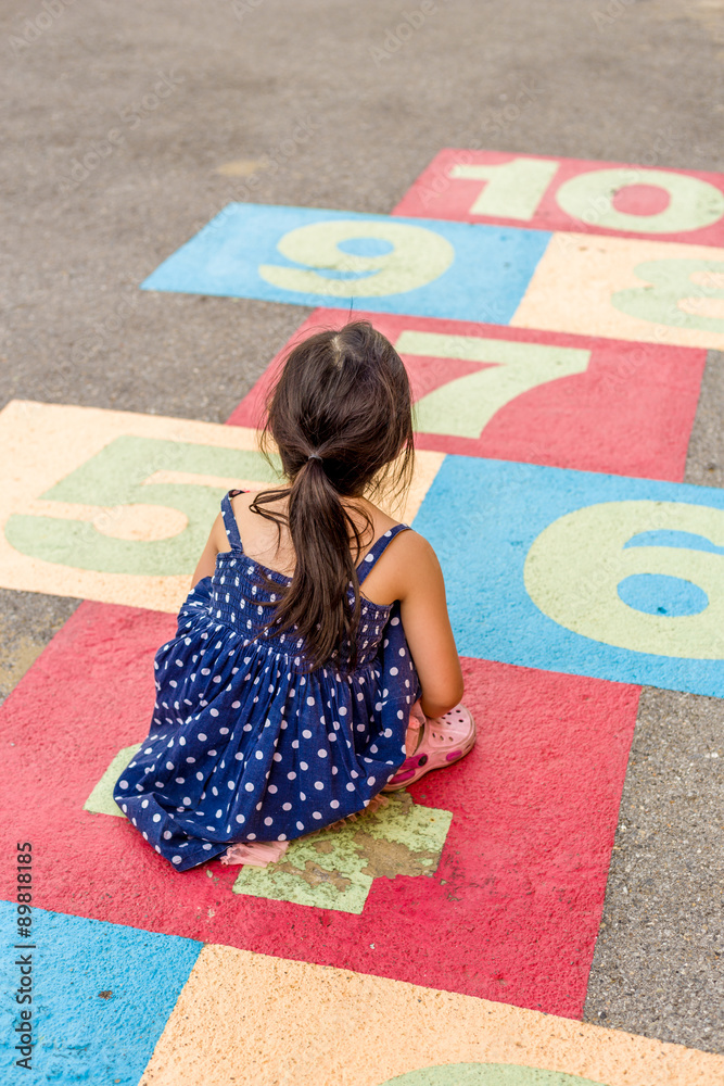 Little Girl Playing Hopscotch / Little Girl Playing Hopscotch on ...