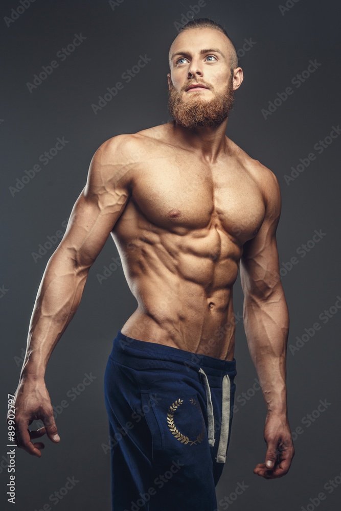 Shirtless muscular bodybuilder with beard Stock Photo | Adobe Stock