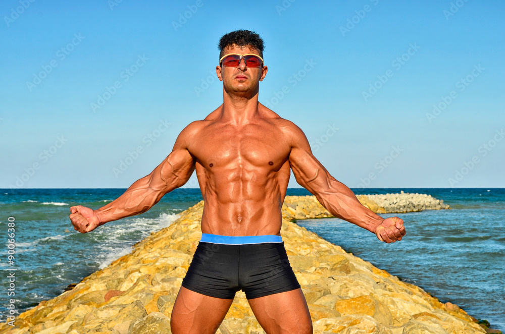 Strong bodybuilder with six pack.Fitness trainer with perfect abs ...
